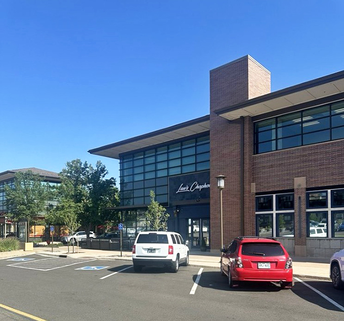 Law's sleek exterior promises contemporary elegance, while inside, primal steak satisfaction awaits the hungry carnivore.