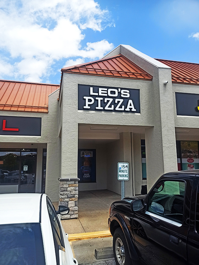 That red metal roof shelters pizza treasures that Kansas City locals will drive across town to devour.
