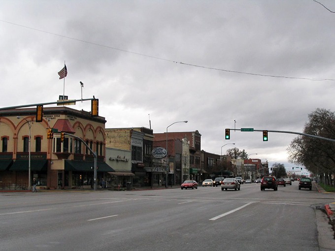 Main street stretches invitingly ahead, where mountain views come free with every stroll.