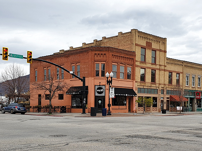 The neon "OPEN" sign at Lucky Slice feels like a friendly invitation to join the neighborhood's worst-kept secret.