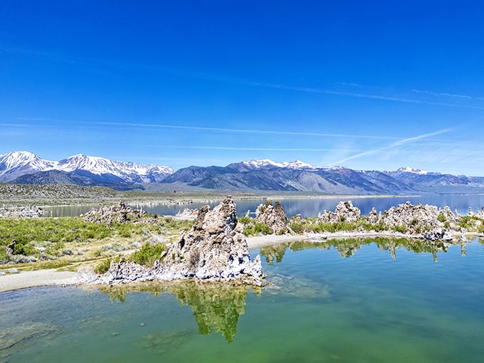 Ancient limestone sculptures emerge from Mono Lake's salty depths, reflecting Sierra peaks like nature's art gallery.