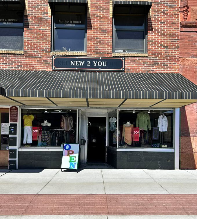 Window displays showcase carefully selected clothing treasures. It's like window shopping where you can actually afford everything!