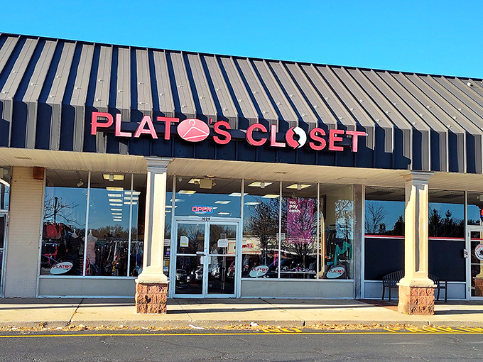 The black awning frames a window to style possibilities. Plato's Closet: where trendy meets thrifty in perfect harmony.