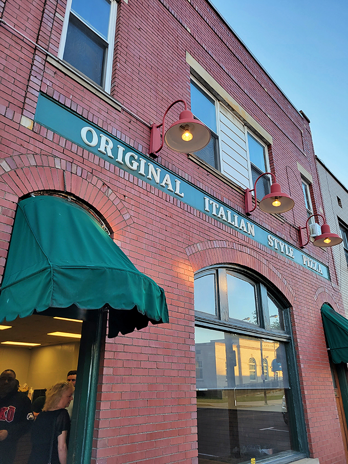 Police Station Pizza: The green building on the corner where locals line up for pizza that should be illegal it's so good.