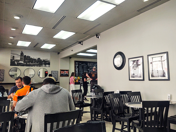 Inside Rae's, black and white photos tell stories while fresh sandwiches create new memories for every satisfied customer. 