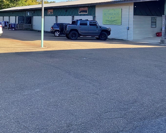 The weathered exterior of Repeat Street hints at the character-filled treasures waiting to be discovered within its walls.