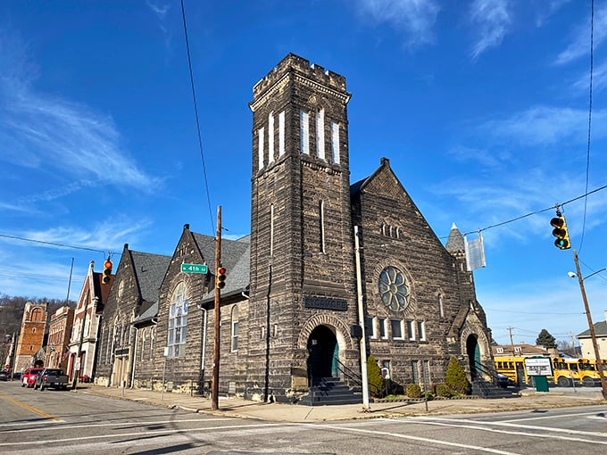 Steubenville's imposing stone church stands as a spiritual sentinel at the crossroads, its Gothic tower reaching skyward like a prayer made permanent.