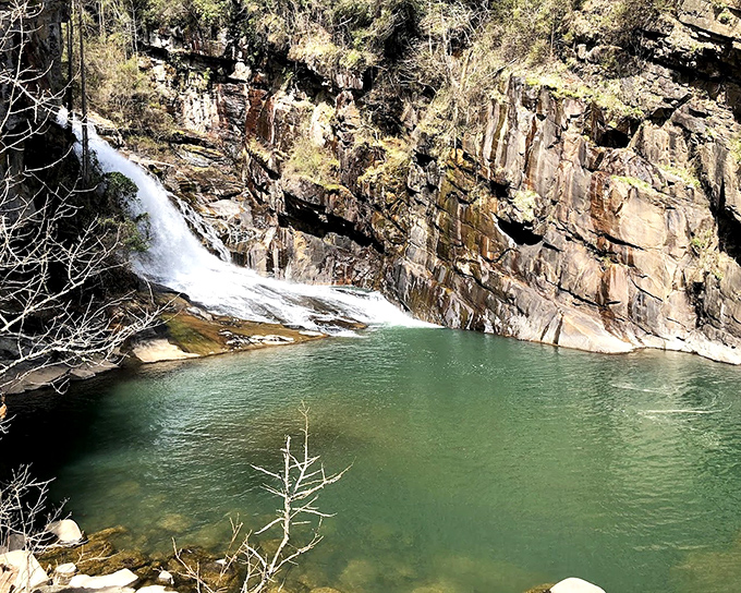 The emerald pool at the base of this waterfall looks inviting, but that water is mountain-cold &ndash; nature's own ice bucket challenge!
