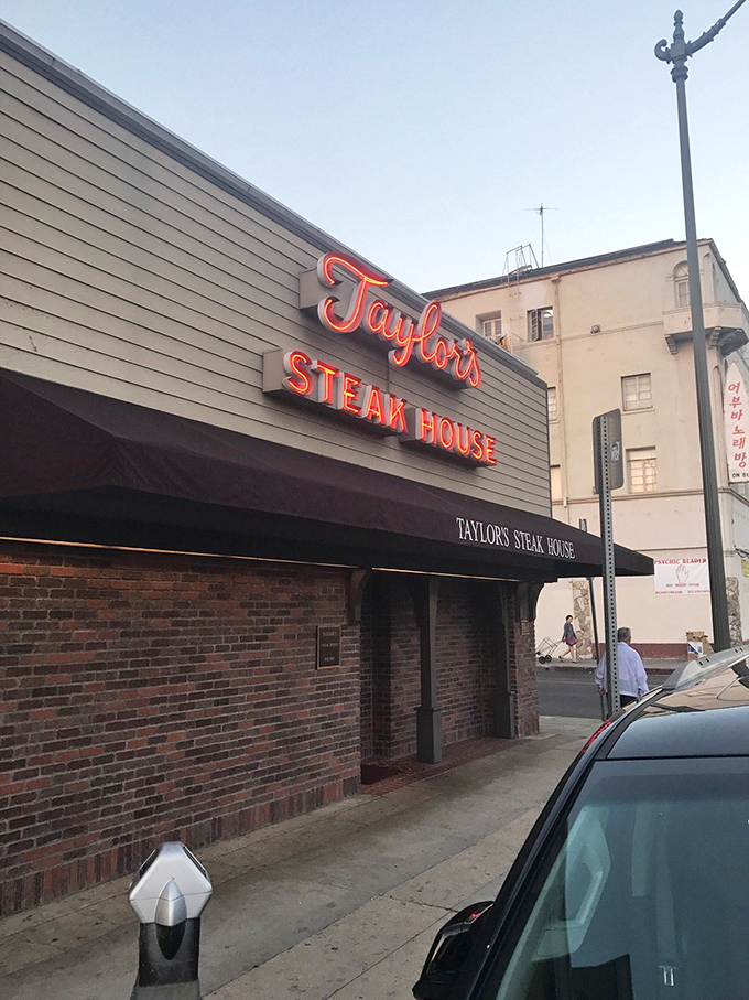 This unassuming brick building houses old-school steakhouse magic – where martinis are cold and the steaks are legendary.