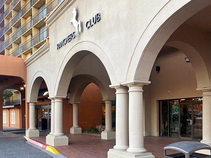 Those impressive columns at The Ranchers Club stand like sentinels guarding flavor. The architectural equivalent of "dress up for dinner tonight."