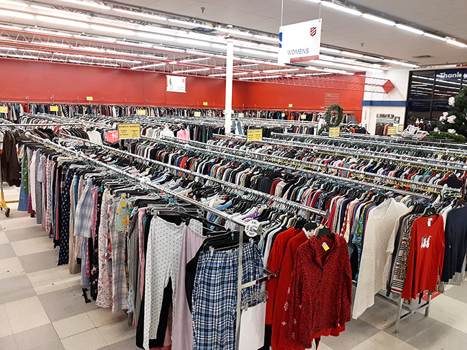 Red walls, red tags, real deals. The Salvation Army's clothing section is organized like a department store dream.