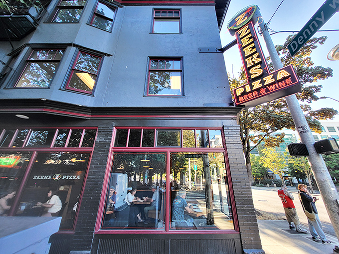 The dappled sunlight outside Zeeks creates the perfect urban oasis for contemplating life's big question: "Should I order another slice?"