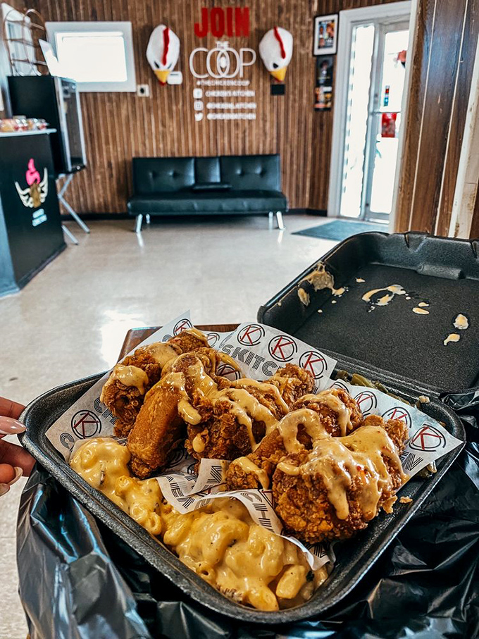 These chicken wings aren't just drizzled with sauce—they're baptized in it. The mac and cheese below is catching all the glory.