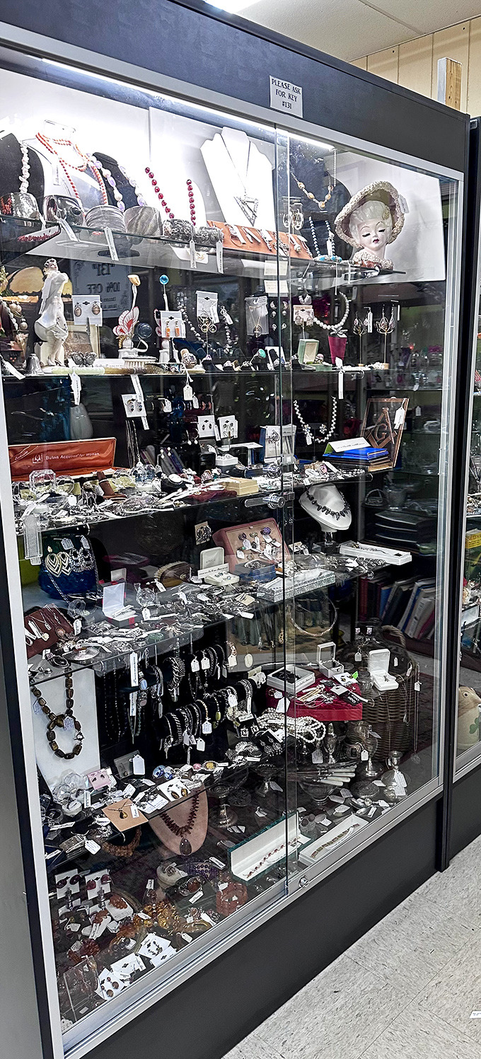 Jewelry heaven behind glass! From vintage pearls to statement pieces, this cabinet holds enough sparkle to make Downton Abbey's Dowager Countess raise an approving eyebrow.