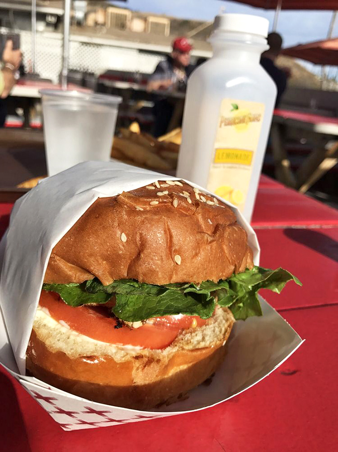 This isn't just a sandwich; it's a California dream on a bun&mdash;fresh ahi, crisp lettuce, and a hint of sauce that ties it all together.