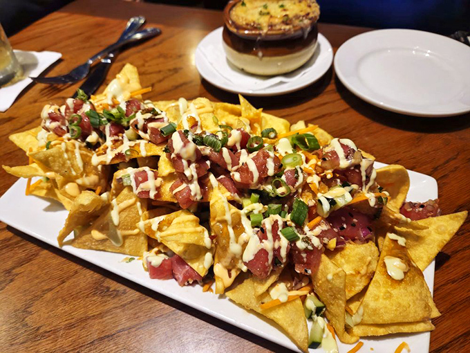 Ahi tuna nachos that bridge the gap between happy hour and seafood heaven. The kind of appetizer that makes the table fall suddenly silent.