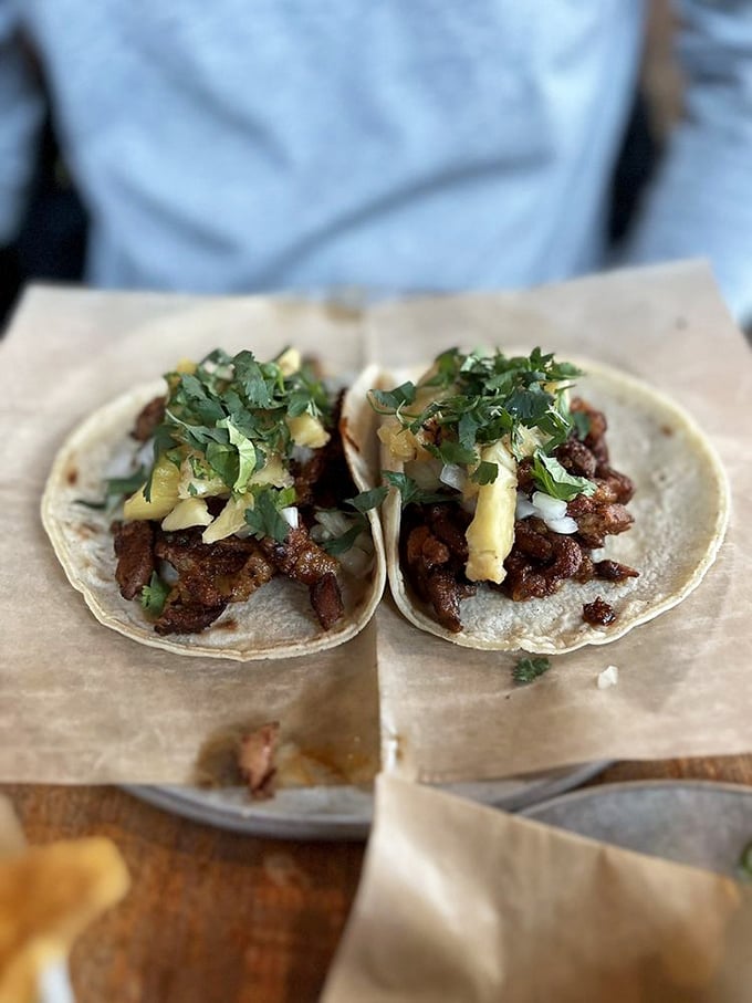Al Pastor tacos&mdash;the headliners of the menu. Marinated pork with grilled pineapple creates that sweet-savory magic that haunts your dreams long after the last bite.