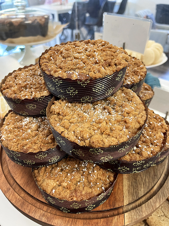 These apple crumbles, stacked like delicious hockey pucks of happiness, promise the perfect balance of sweet fruit and buttery streusel.