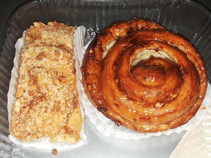 The cinnamon roll's perfect spiral might hypnotize you, while that crumb-topped apple bar whispers, "Diet? What diet?"