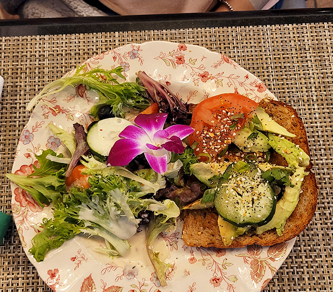 Avocado toast that actually deserves its Instagram fame&mdash;this isn't just trendy food, it's a garden of textures on artisanal bread.