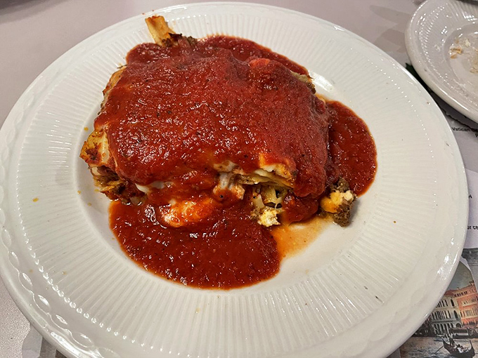 Lasagna that stands tall and proud, layers of pasta, cheese, and sauce in perfect harmony. It's architecture you can eat, and it's magnificent.