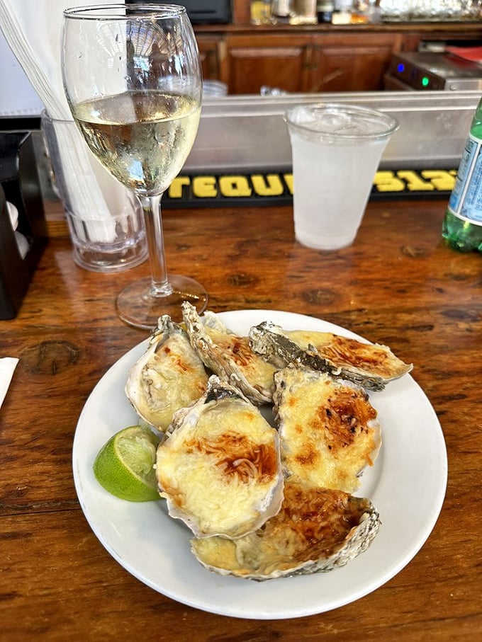 These baked oysters aren't just appetizers&mdash;they're little seafood thrones crowned with cheese and paired with a glass of possibility.