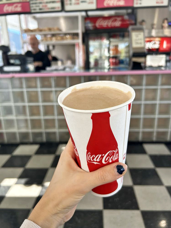 This chocolate shake isn't messing around. Thick enough to require serious straw commitment, yet worth every bit of effort.