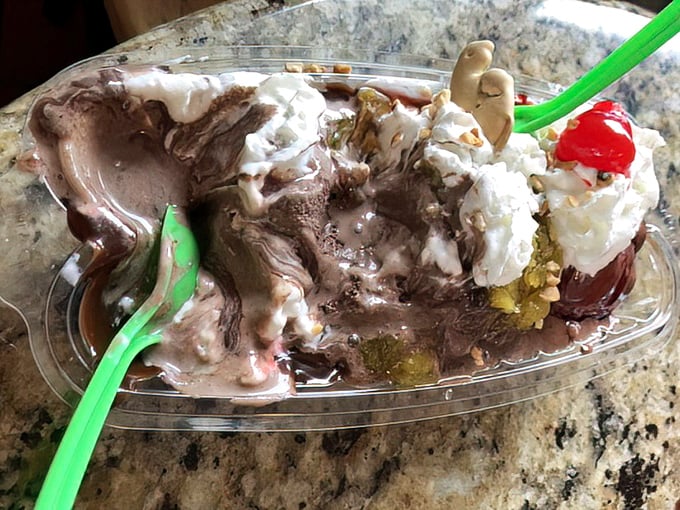 Not so much a sundae as an archaeological dig through layers of chocolate, whipped cream, and what appears to be happiness in physical form.