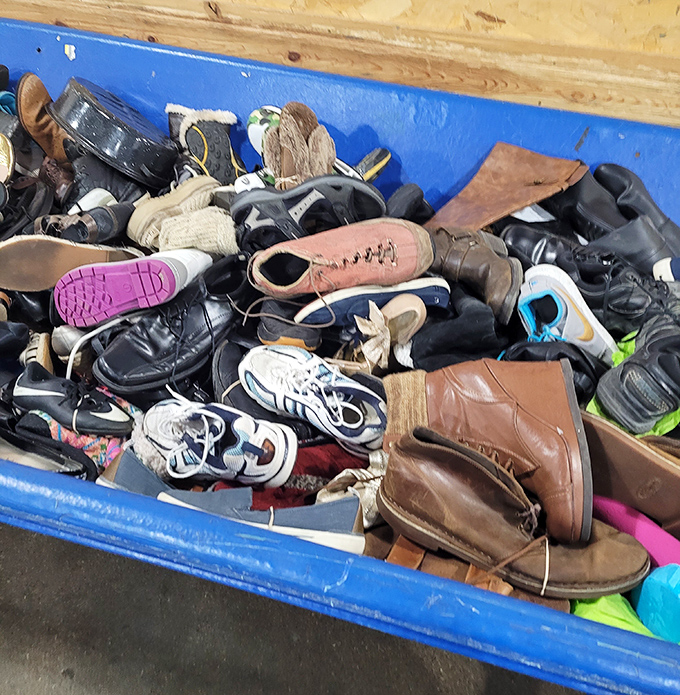 The footwear bin: where one person's discarded boots become another's perfect vintage find. Somewhere in this leather landscape lies your next favorite pair.