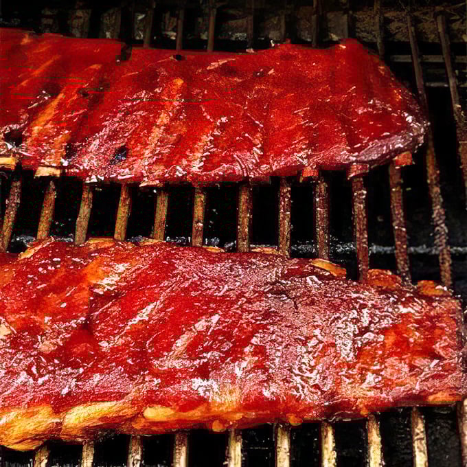 These ribs aren't just cooked &ndash; they're serenaded into tenderness. That glossy, caramelized sauce is the kind of thing food dreams are made of.