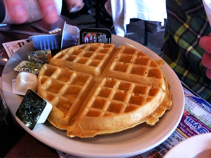 This Belgian waffle isn't just breakfast&mdash;it's an edible work of art waiting for its syrup waterfall moment.