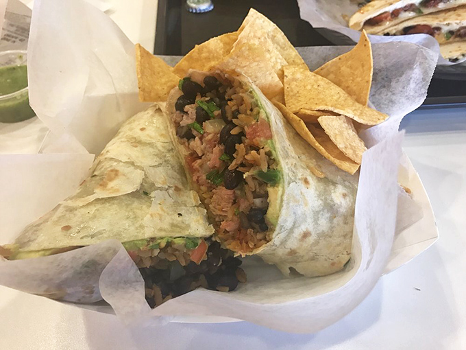 Rice, beans, and protein in perfect harmony, like the Beatles of burritos. The fresh cilantro adds that high note that ties everything together.