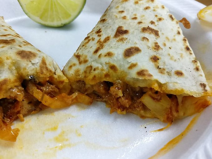 A quesadilla that makes you question every other quesadilla you've ever eaten. The golden-brown exterior gives way to a molten interior that demands your full attention.