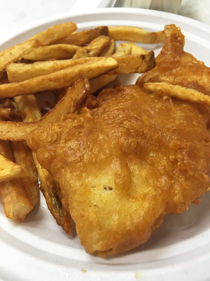 Architectural perfection: golden fish, hand-cut fries, and that essential dollop of coleslaw. The holy trinity of comfort food, Detroit-style.
