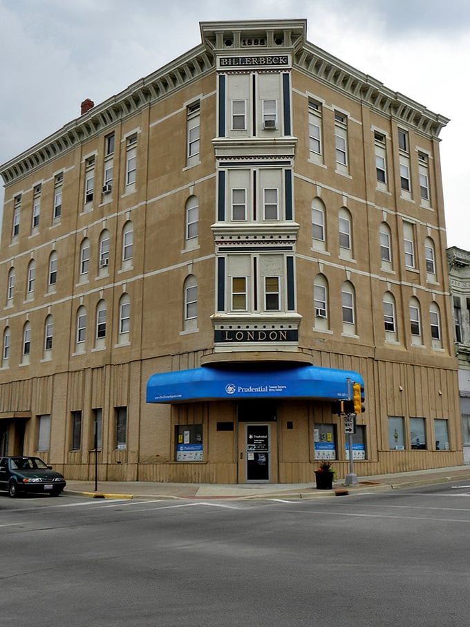 The Billerbeck building anchors downtown with the confidence of someone who knows they're wearing the perfect vintage outfit. History with a blue awning accent.