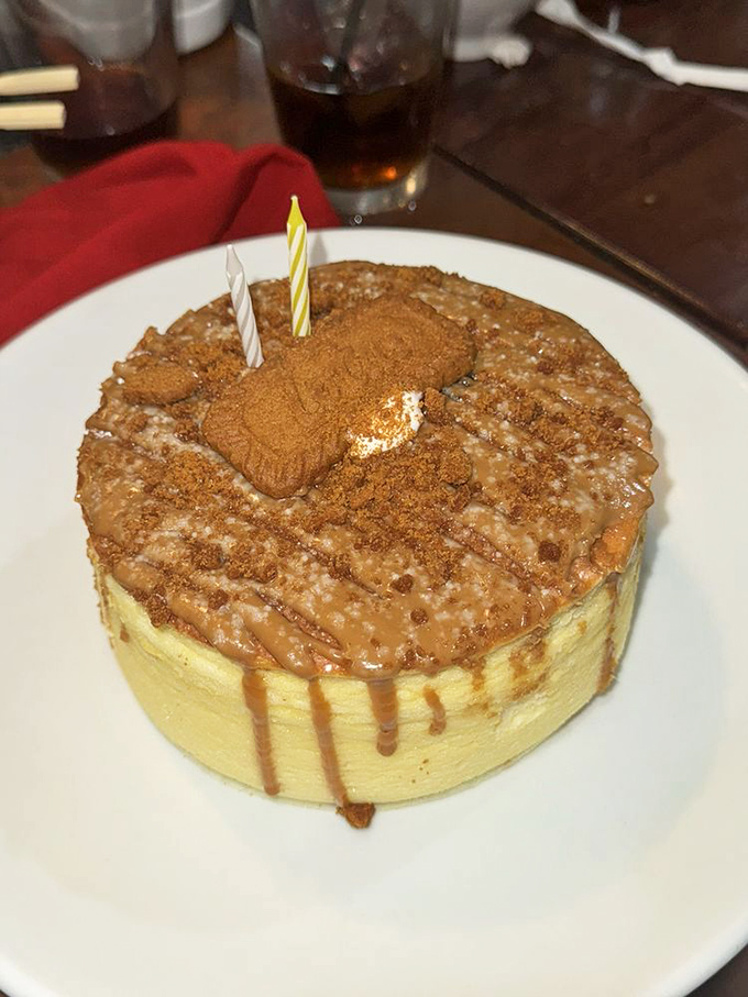 Birthday candles and Biscoff topping transform this cheesecake into a celebration. Whoever said "you can't have your cake and eat it too" clearly never came here.