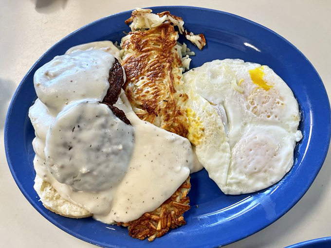 Eggs, gravy, and hashbrowns performing a beautiful breakfast ballet. The kind of morning trio that makes you forget all about green smoothies.