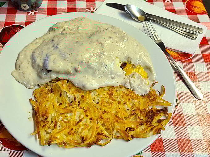 Country gravy blankets these hash browns like a warm February snow. This plate doesn't just feed your body&mdash;it hugs your soul.