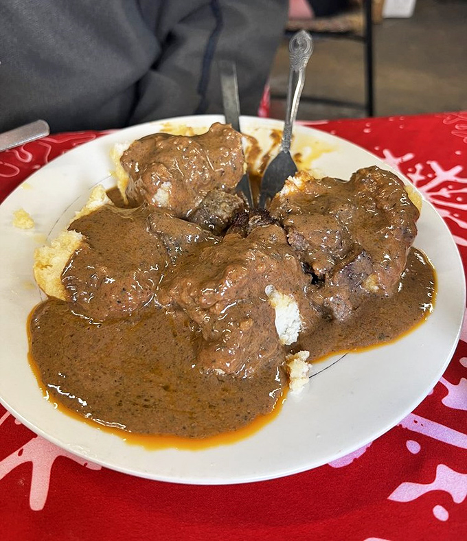 Biscuits and gravy here isn't a side dish&mdash;it's the main event. This rich, peppery blanket of gravy doesn't just cover the biscuits, it embraces them.
