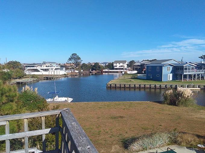Waterfront tranquility on Sandbridge's bay side, where boats bob gently and stress dissolves faster than salt in warm water.