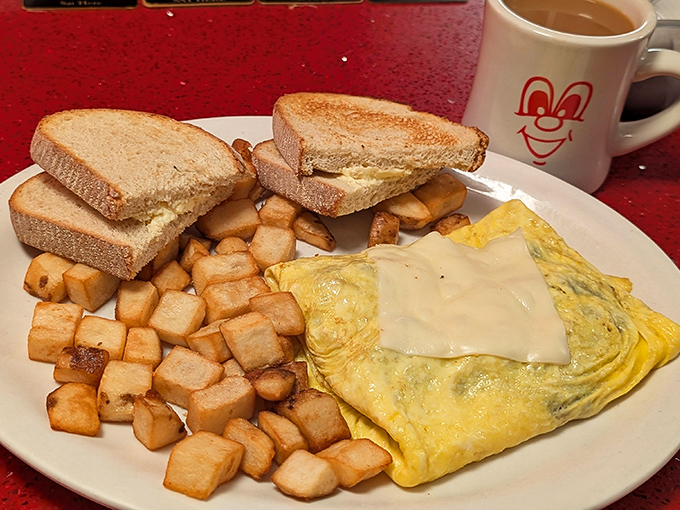Breakfast perfection doesn't exi&mdash; wait, I stand corrected. Golden home fries, fluffy eggs, and toast ready for its butter bath.