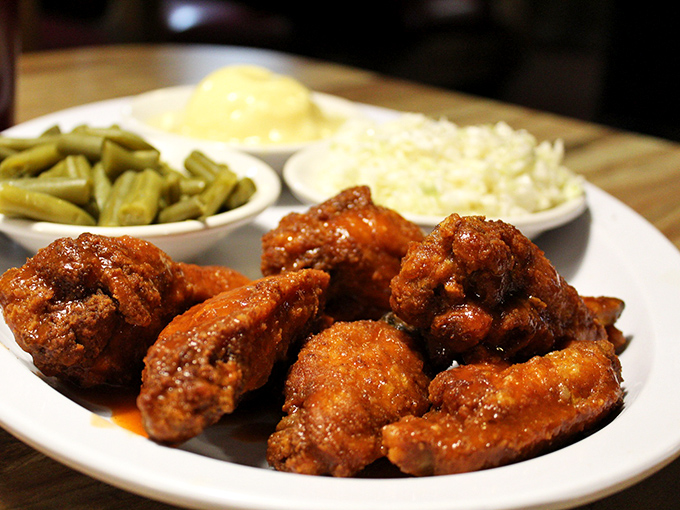 Buffalo wings done right: crispy, saucy, and unapologetically messy. Keep those napkins handy—you're going to need reinforcements.