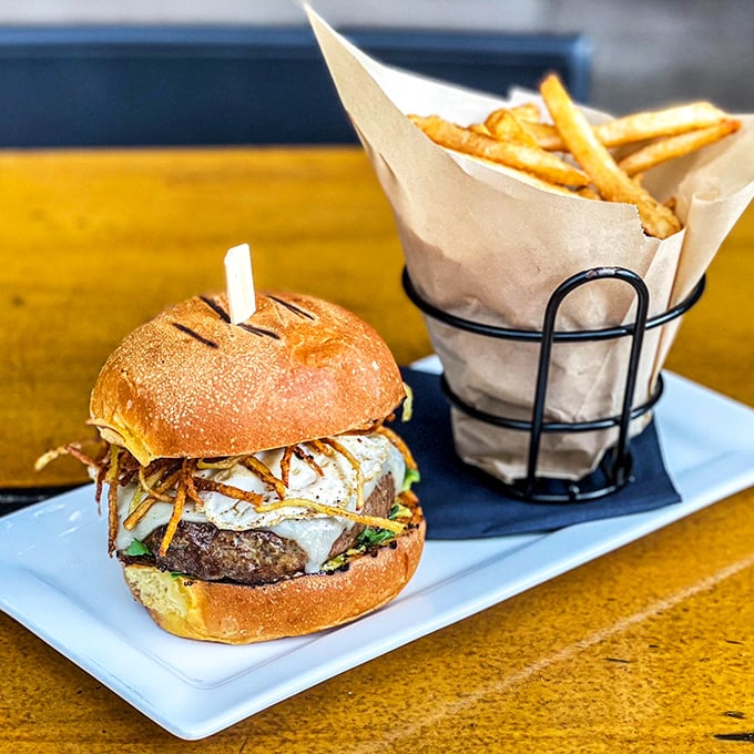 This isn't just another burger&mdash;it's edible architecture. The perfect stack of flavor that proves Philadelphia knows more than just cheesesteaks when it comes to handheld happiness.