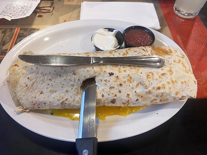 Breakfast burritos should always look like this&mdash;golden-brown, slightly crisp, and threatening to spill their eggy treasures with each slice of the knife.