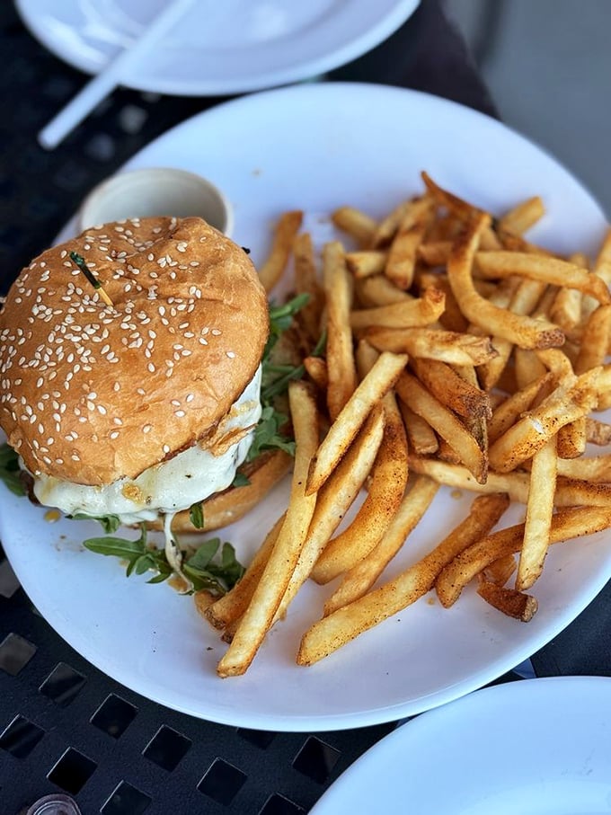 A burger so beautiful it deserves its own Instagram account. The sesame-studded bun cradles fresh greens and a patty cooked to perfection.