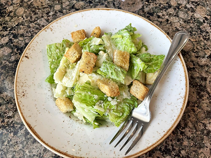 Even Caesar salad gets the royal treatment here—crisp romaine, house-made croutons, and a dressing that would make Julius himself request seconds.
