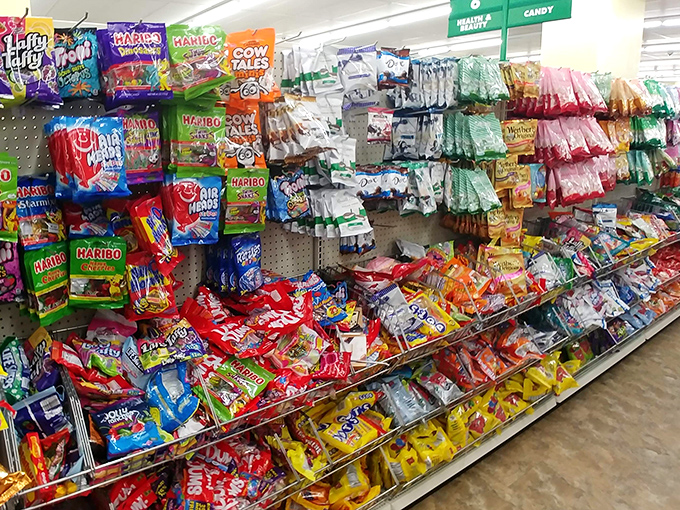 Candy paradise! Name brands and nostalgic treats line these shelves, proving that sweetness doesn't require a bitter hit to your wallet.