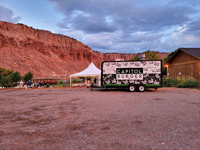 Food trucks reach peak deliciousness when parked against crimson cliffs. Capitol Burger's mobile feast proves great taste travels well in these parts.