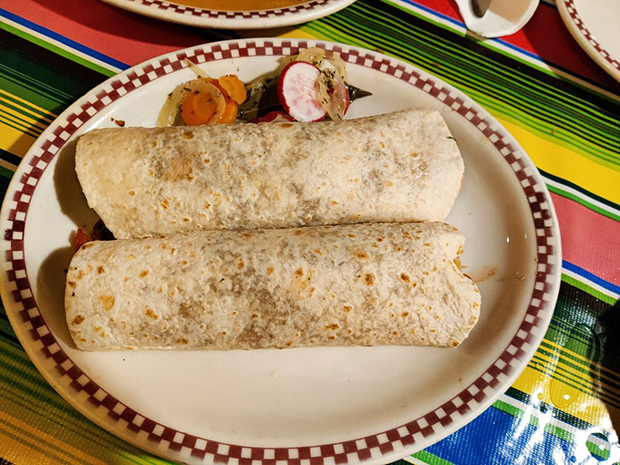 Two burritos, simple and unassuming, yet containing multitudes&mdash;like finding out your quiet neighbor secretly knows how to tango professionally.