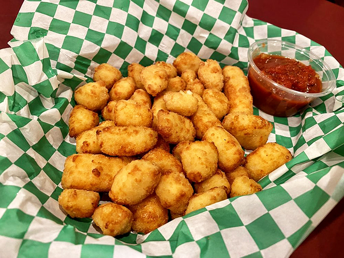 Golden nuggets of joy! These cheese curds achieve the perfect balance: crispy exterior giving way to that signature Wisconsin-inspired squeak and pull.